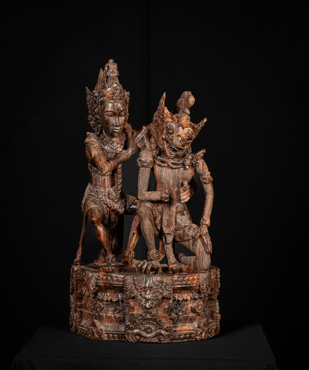 Balinese wood carving – Barong with attendant 48cm